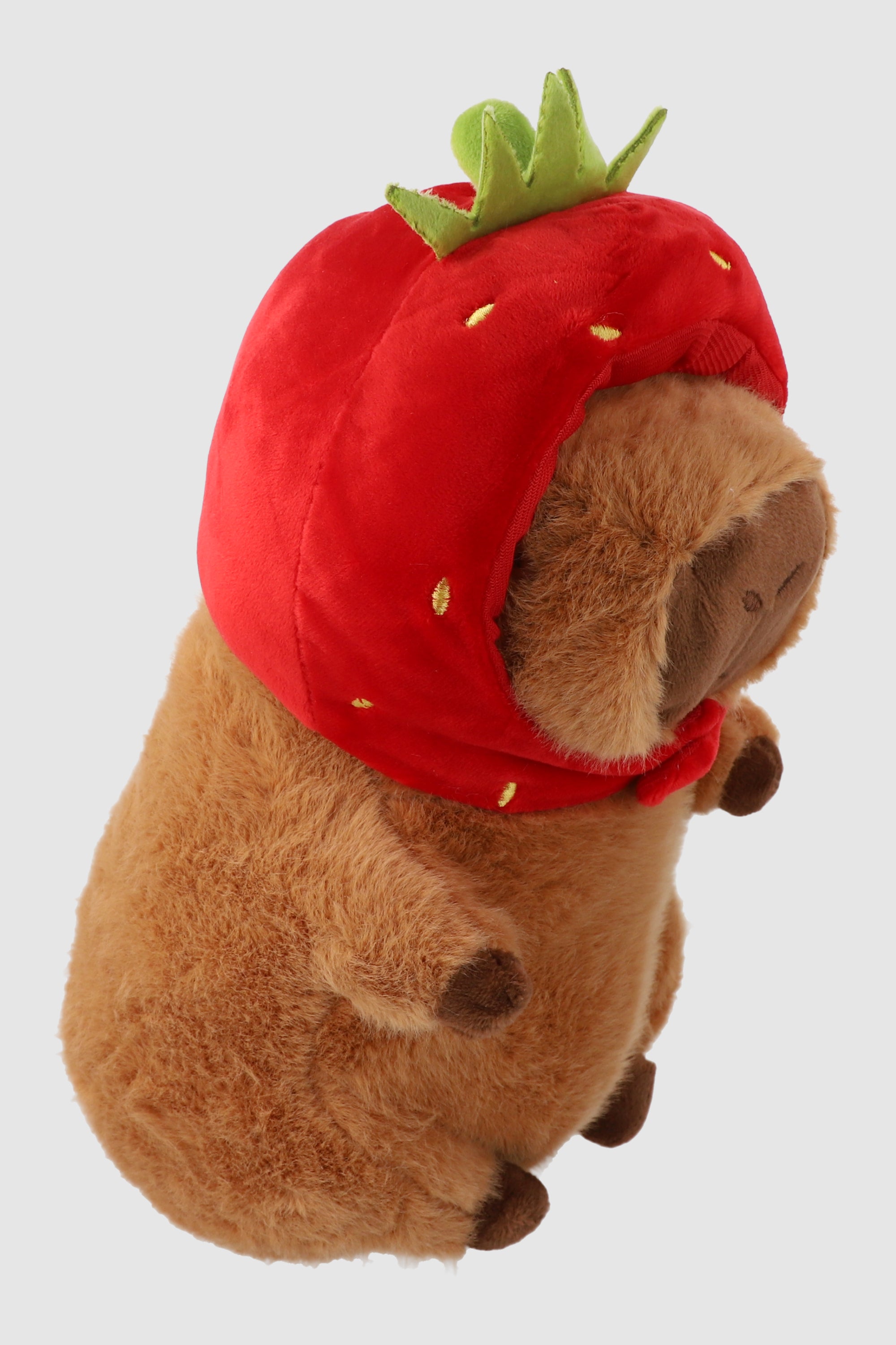 Peluche capibara gorro fresa